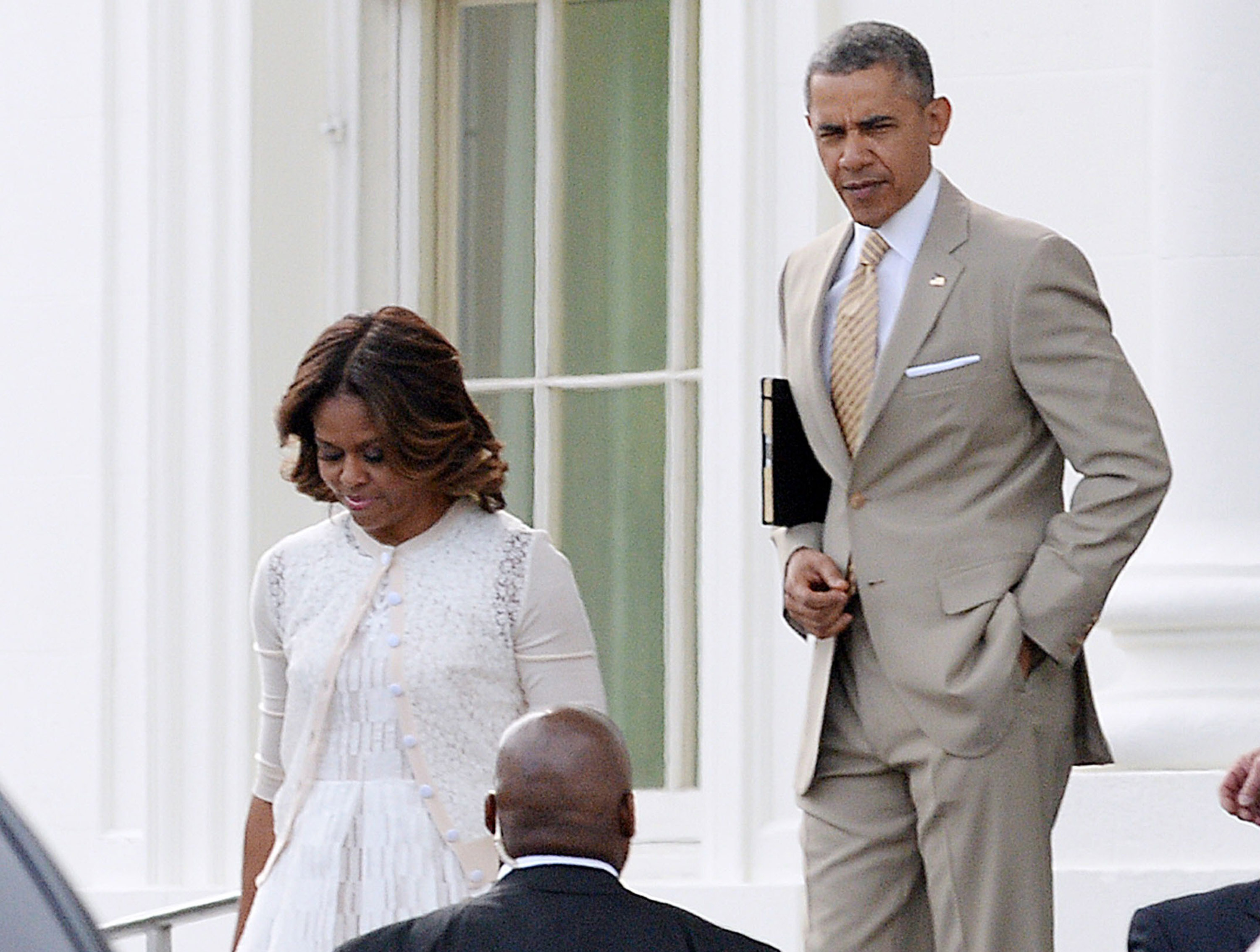 Barack Obama Heads To Easter Sunday Service In Khaki Suit (PHOTOS ...