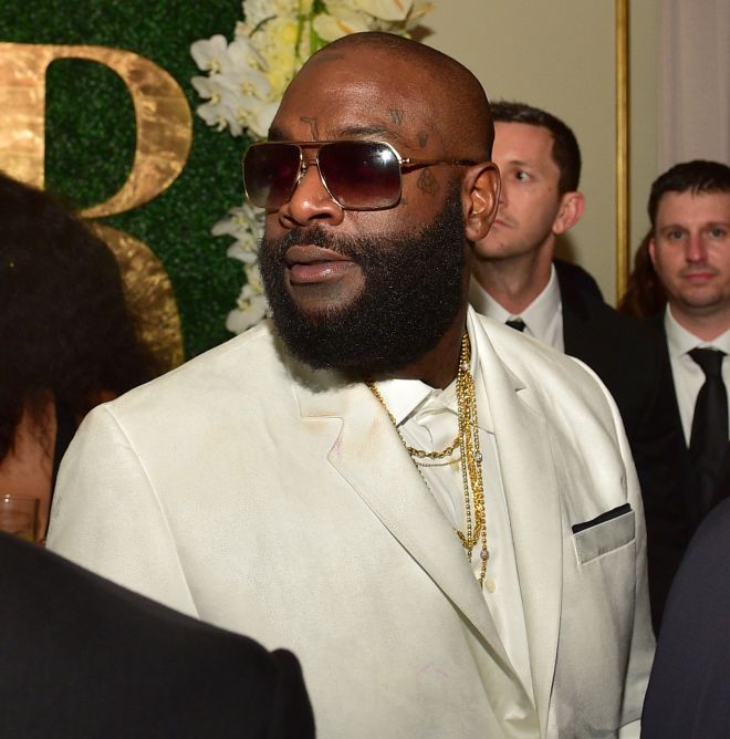 Caption This: A Steamy Pic Of Rick Ross With A Fan Goes Viral